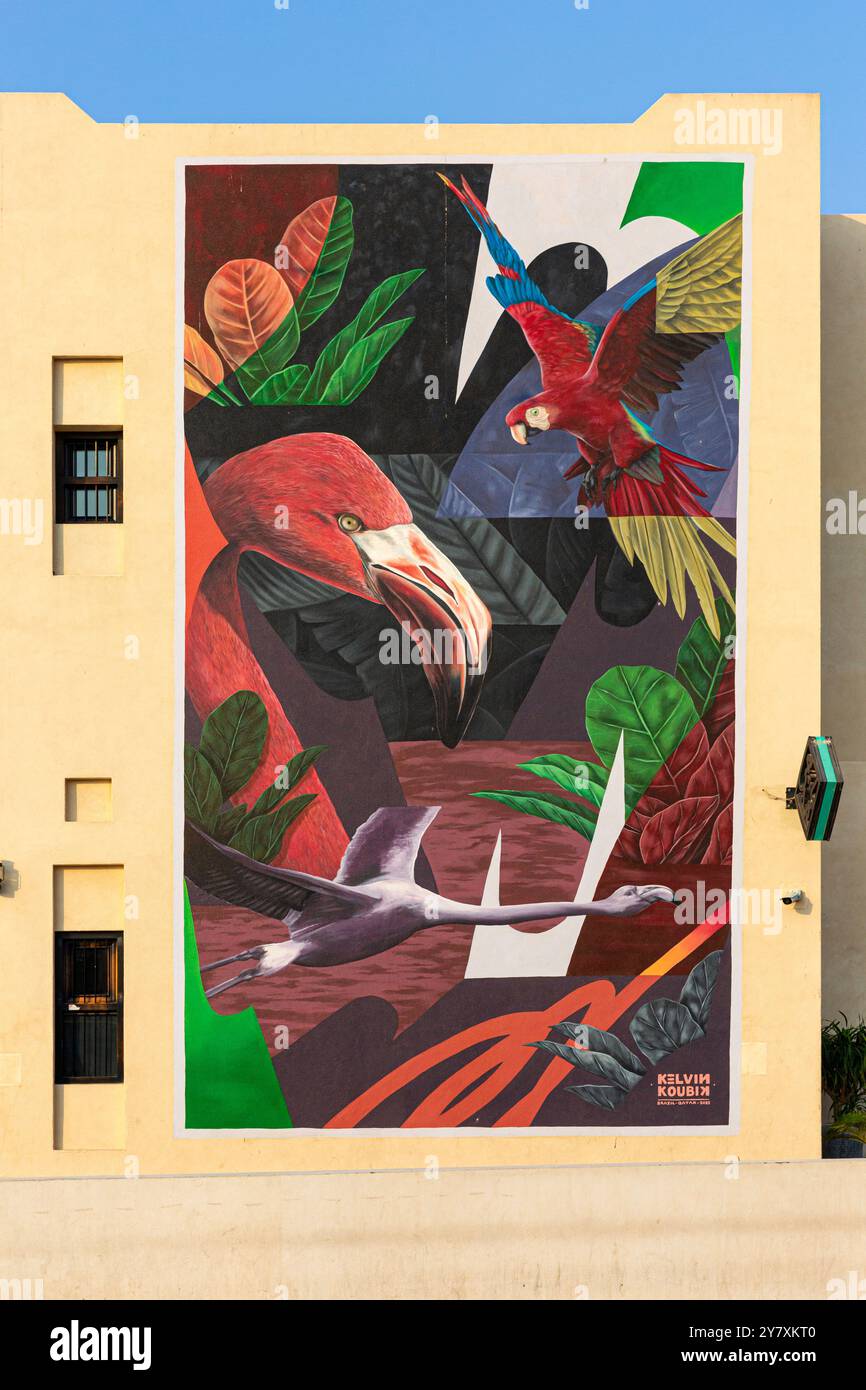 A beautiful mural with flamingos and parrots at the Katara Cultural ...