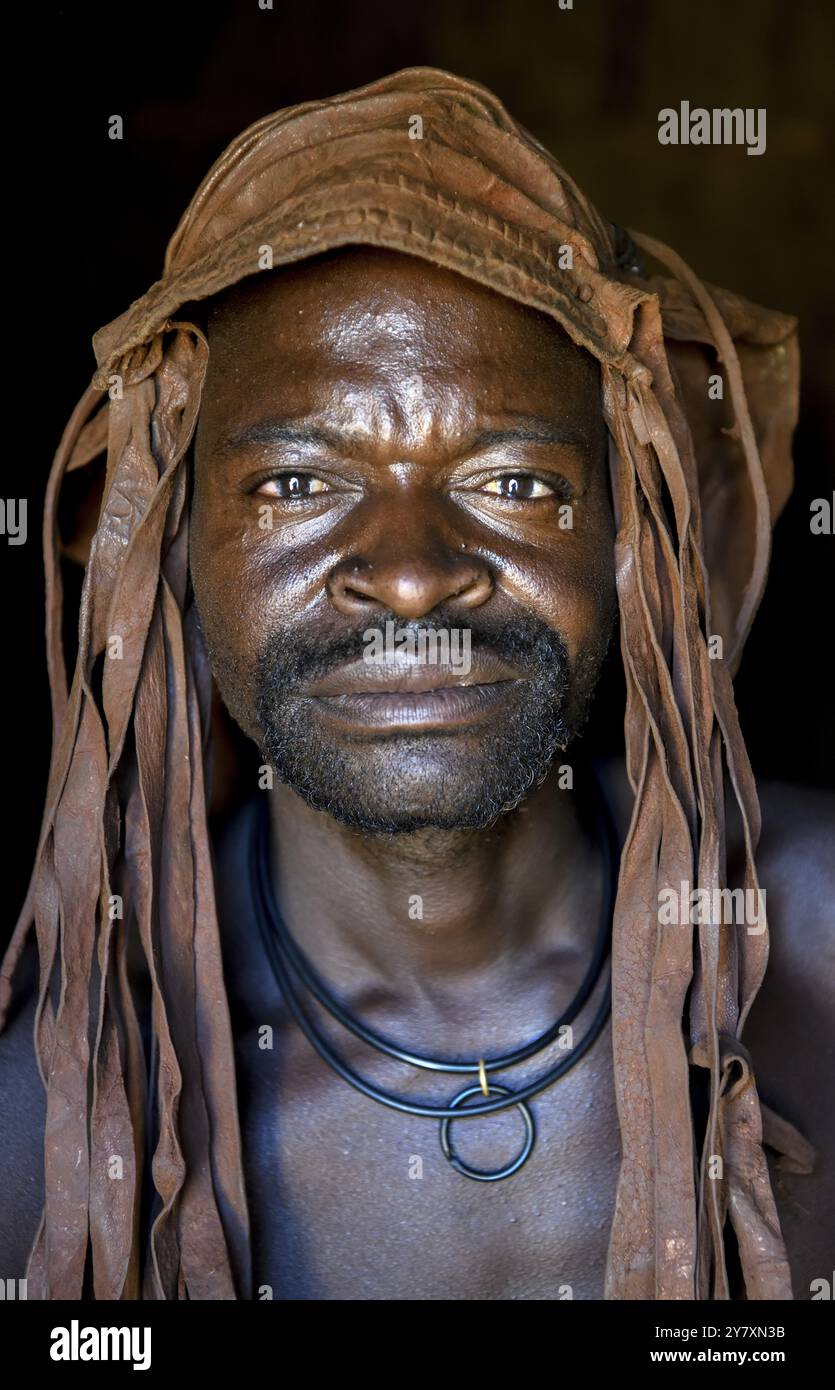 Himba man in his hut, Ohandungu, Kunene region, Kaokoveld, Namibia ...