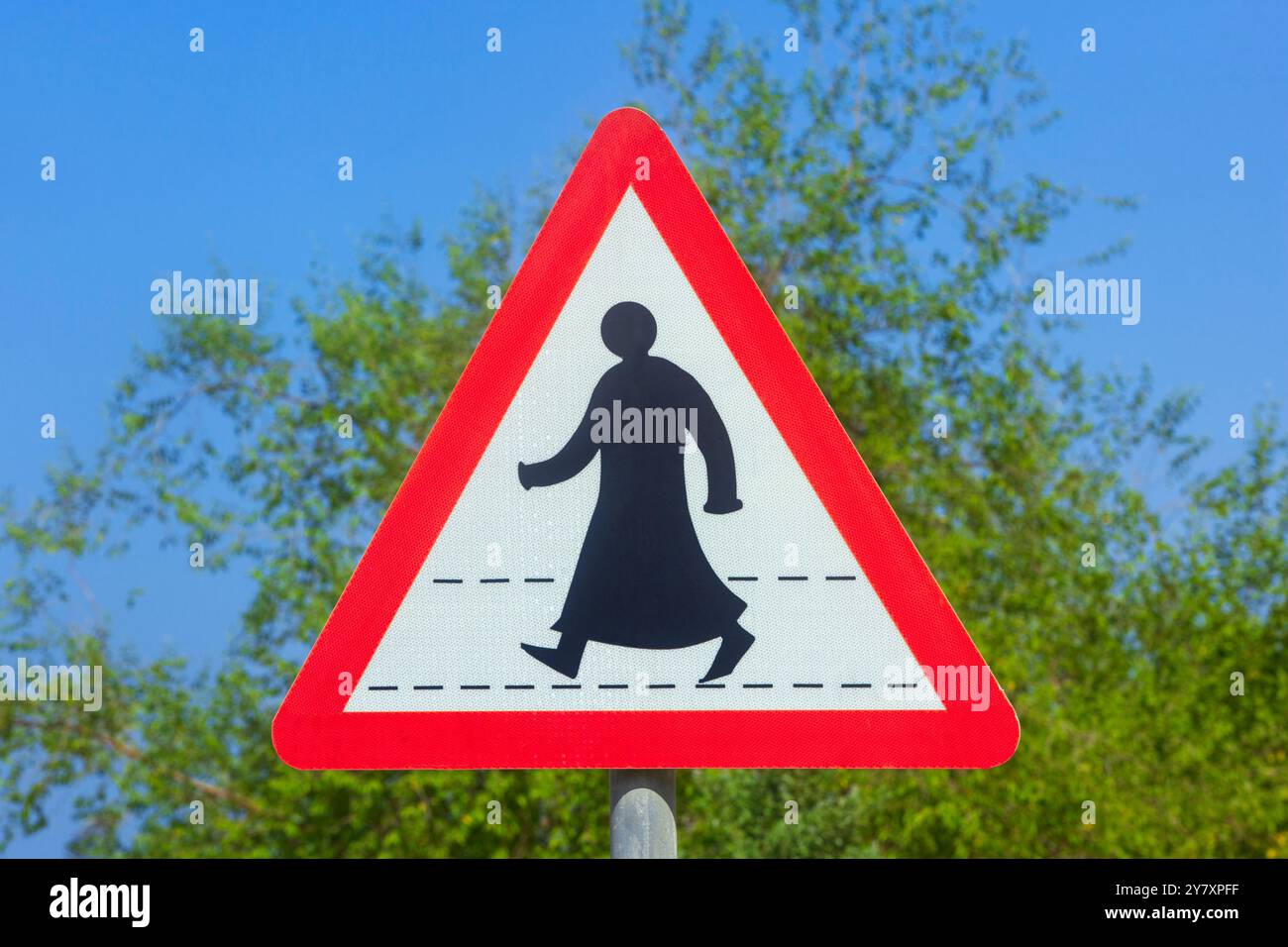 A Qatari traffic sign warning about a pedestrian crossing in Doha ...