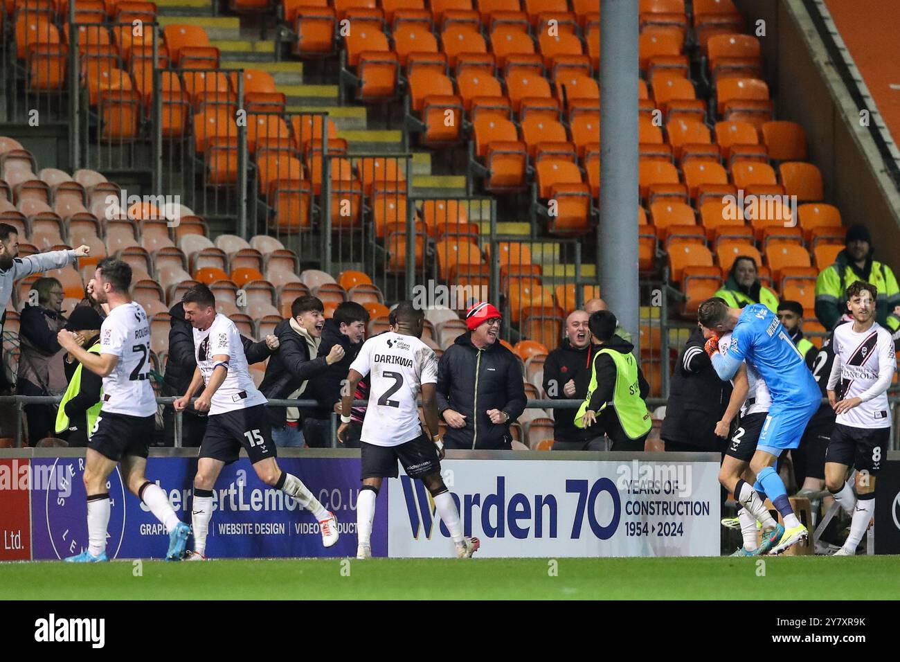 Lincoln City players celebrates their side's goal to make it 1-1 during ...