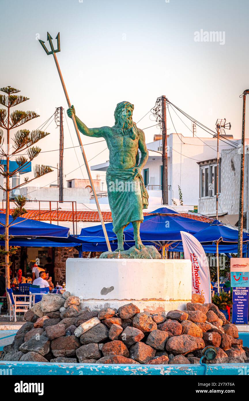 The statue of Poseidon at the port of Mastichari on the island of Kos ...