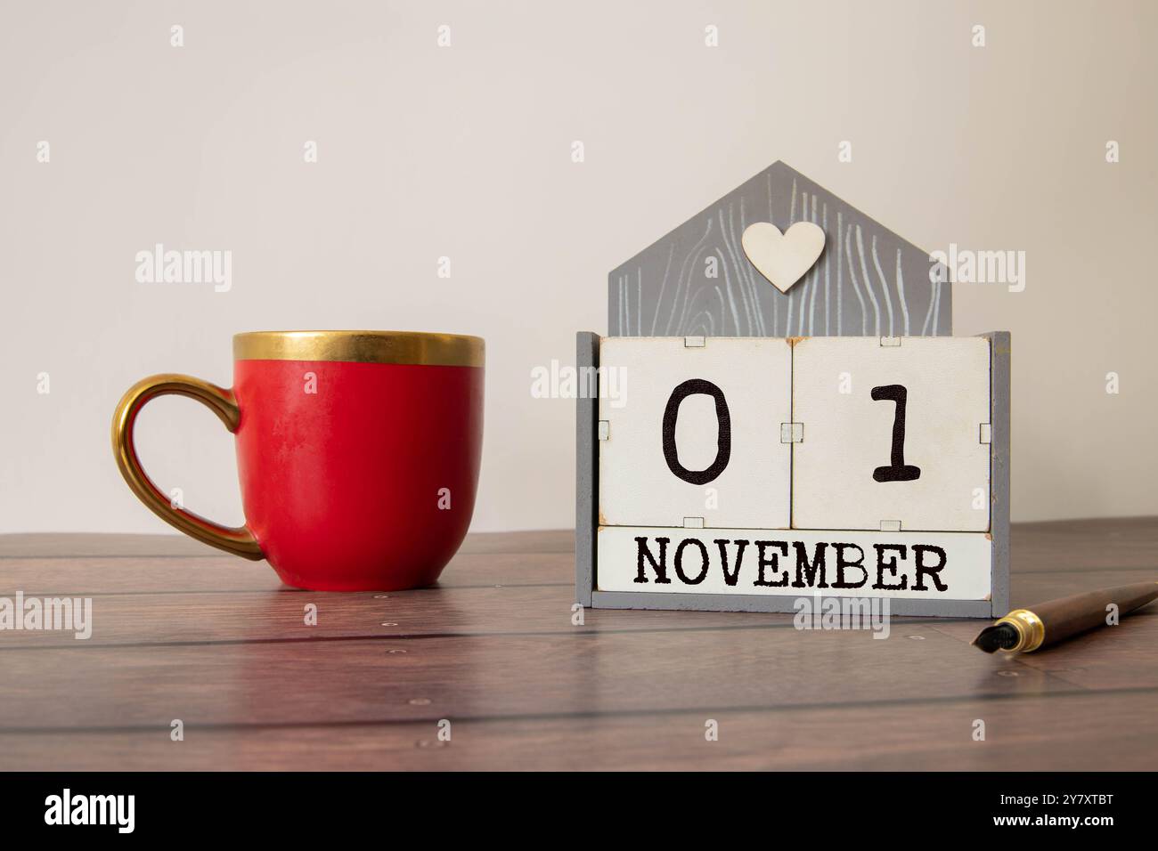 Wooden perpetual calendar showing the 1st of November Stock Photo - Alamy