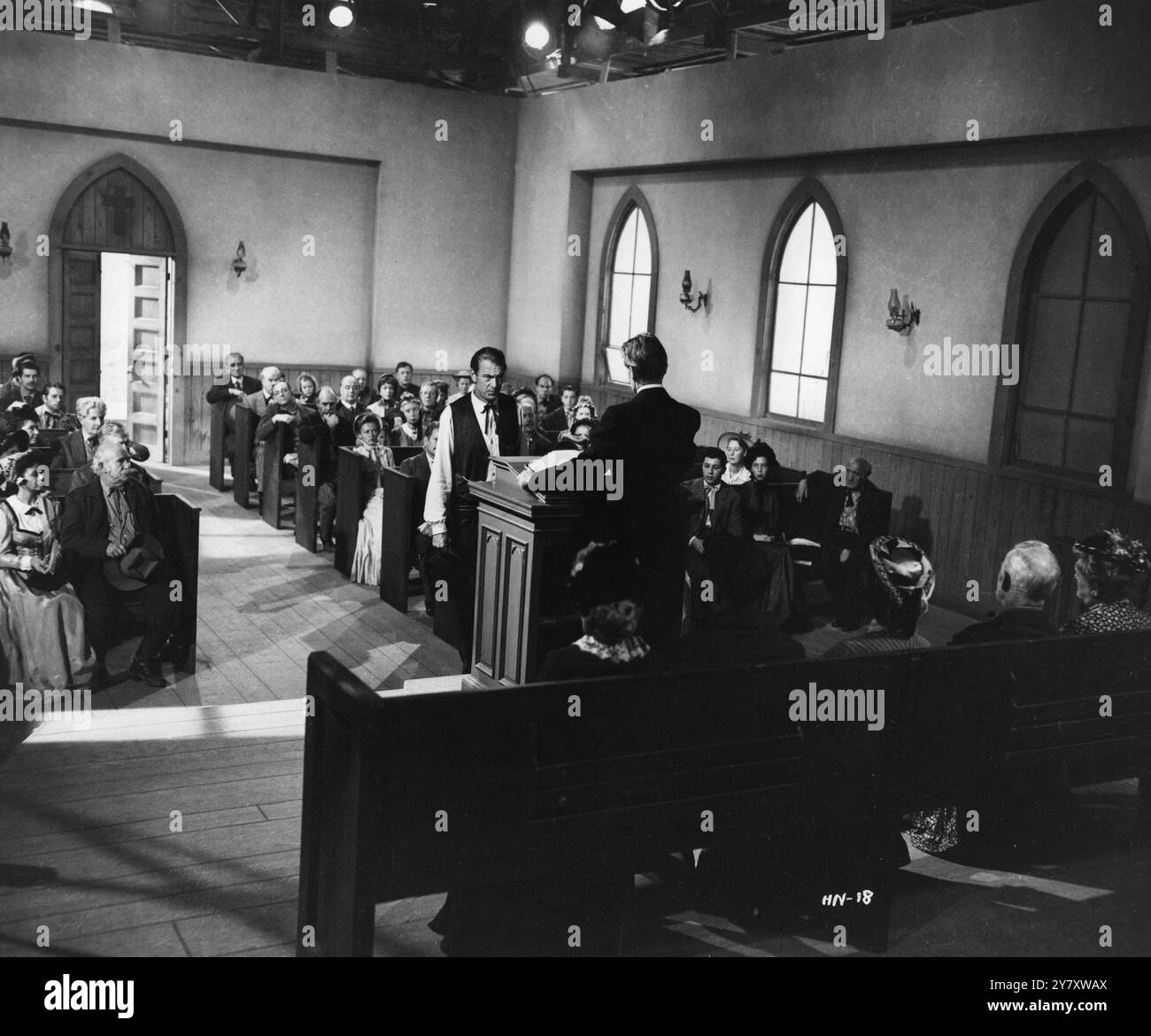 GARY COOPER and MORGAN FARLEY in a scene from HIGH NOON 1952 Director ...