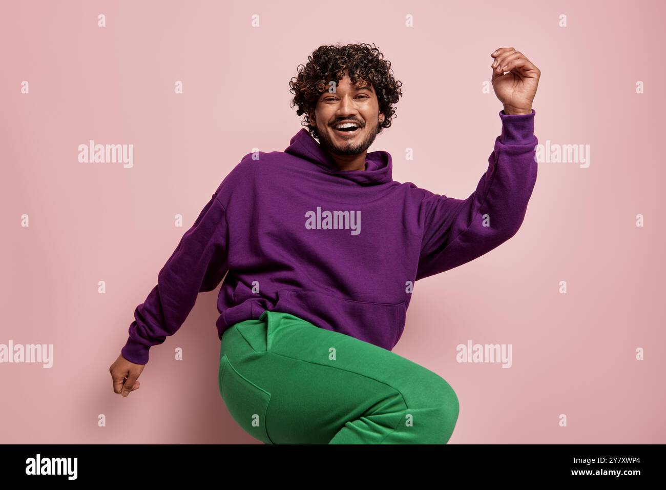 Indian man dancing looking camera hi-res stock photography and images ...