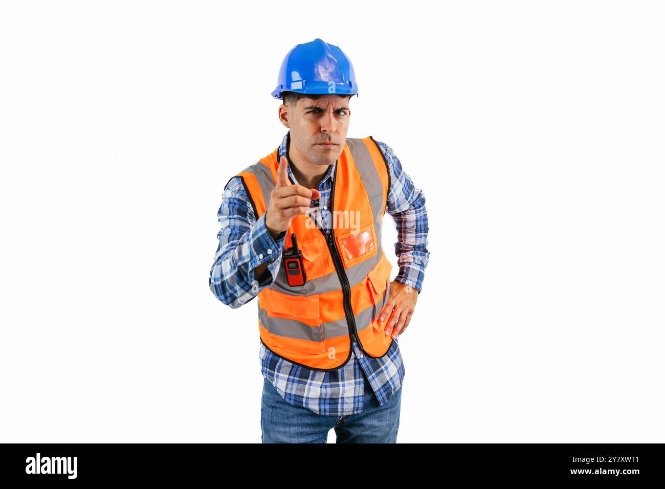 angry construction worker wearing an orange safety vest and hard hat is ...