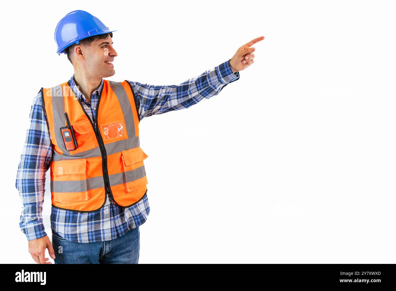copyspace construction worker in an orange safety vest and hard hat ...