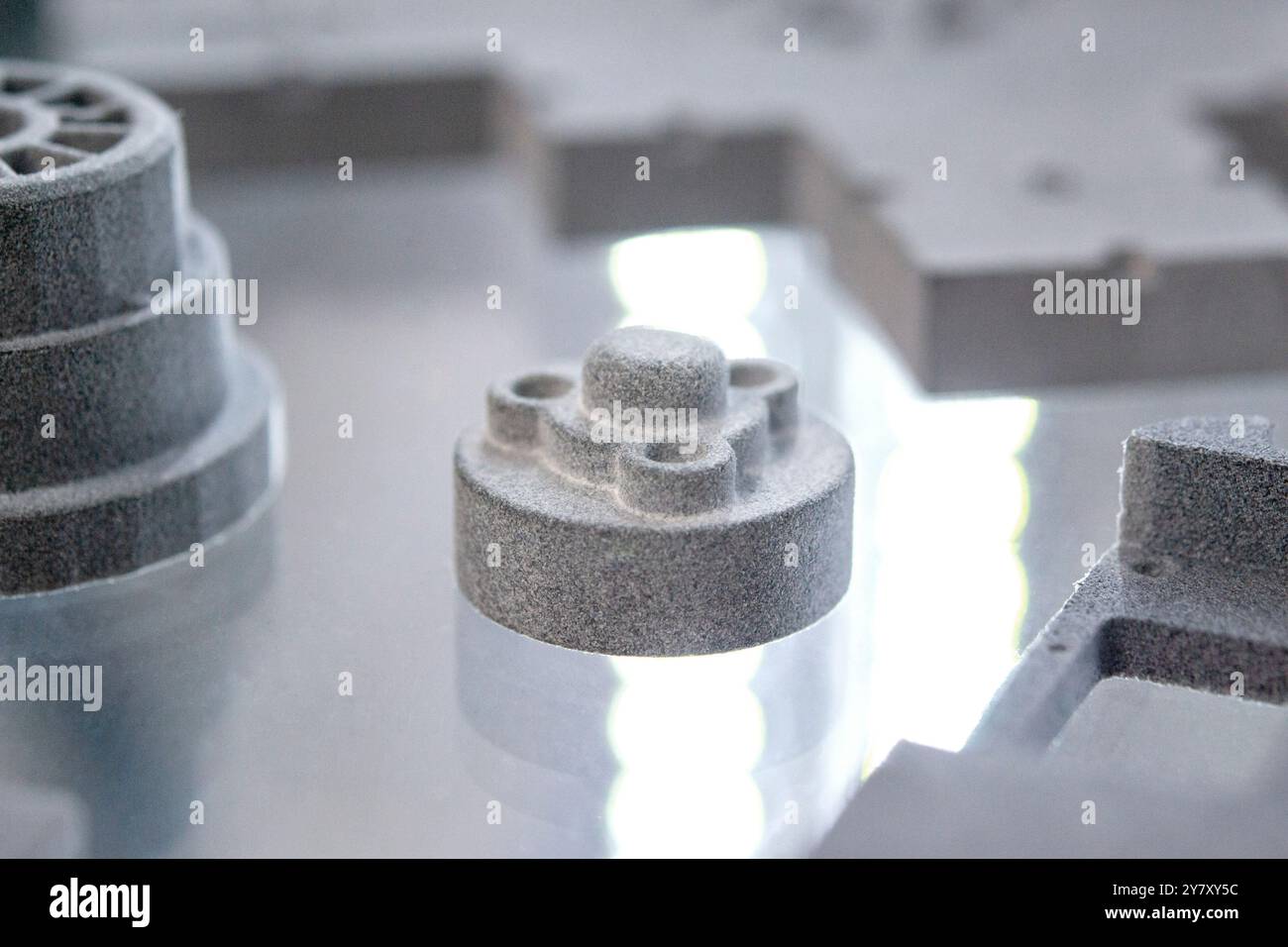 Object printed on a 3D printer from molten plastic powder. Different ...