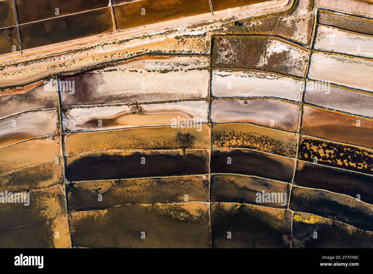 Top view salt pans showcasing seawater evaporation and salt production ...