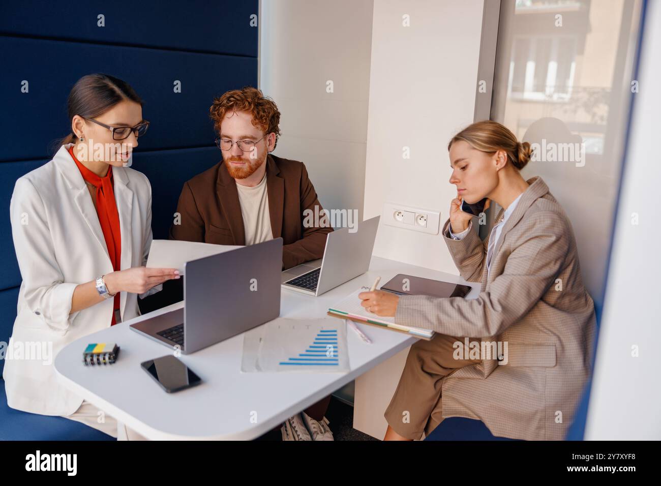 A Business Meeting with a Collaborative Team in a Modern and Inviting ...