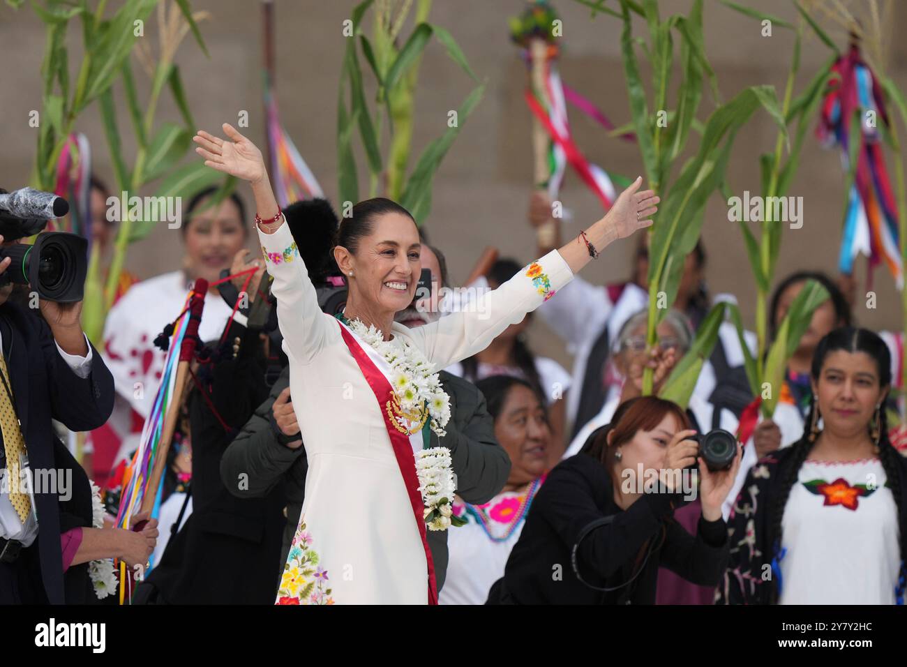 New President Claudia Sheinbaum gestures to the crowd during a ceremony ...