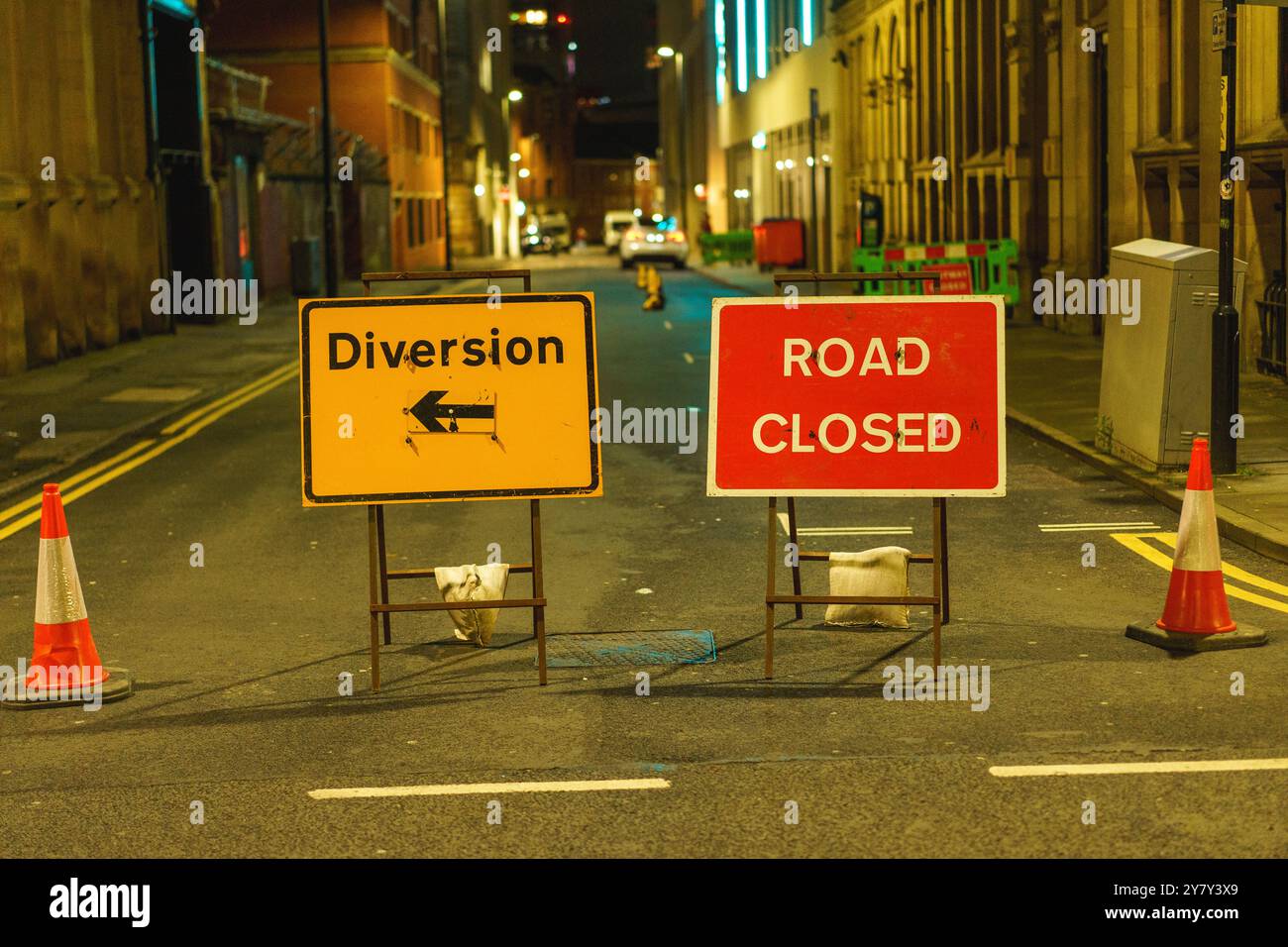 Signs in Manchester city centre Stock Photo - Alamy