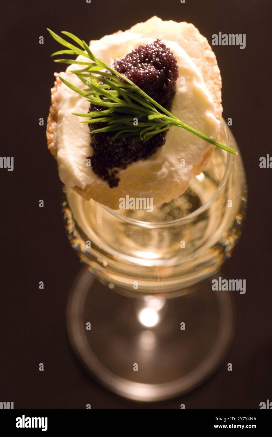 Cream cheese, caviar, tarragon Stock Photo - Alamy
