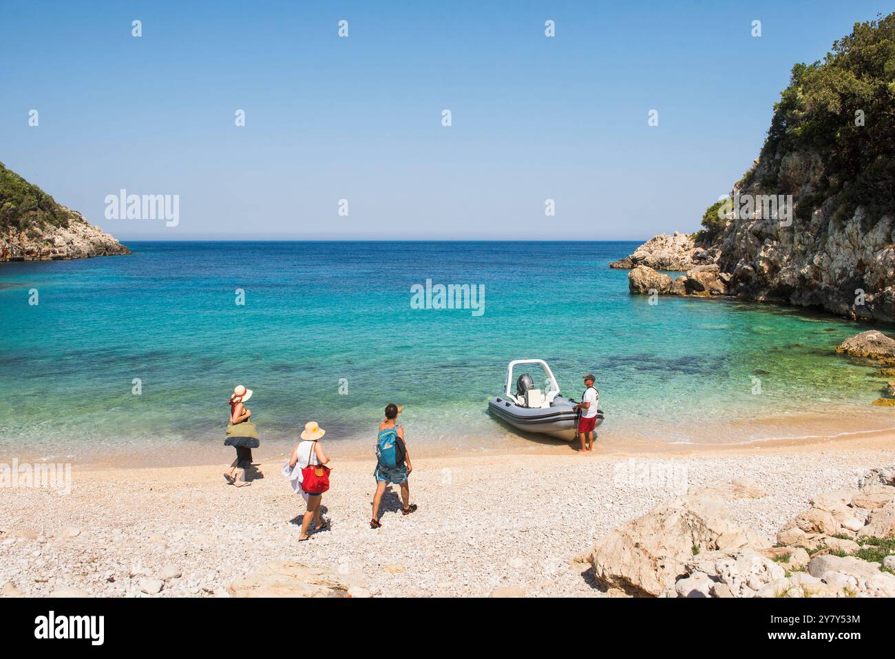 Boarding a zodiac on the beach of Brisana, Peninsula of Karaburun ...