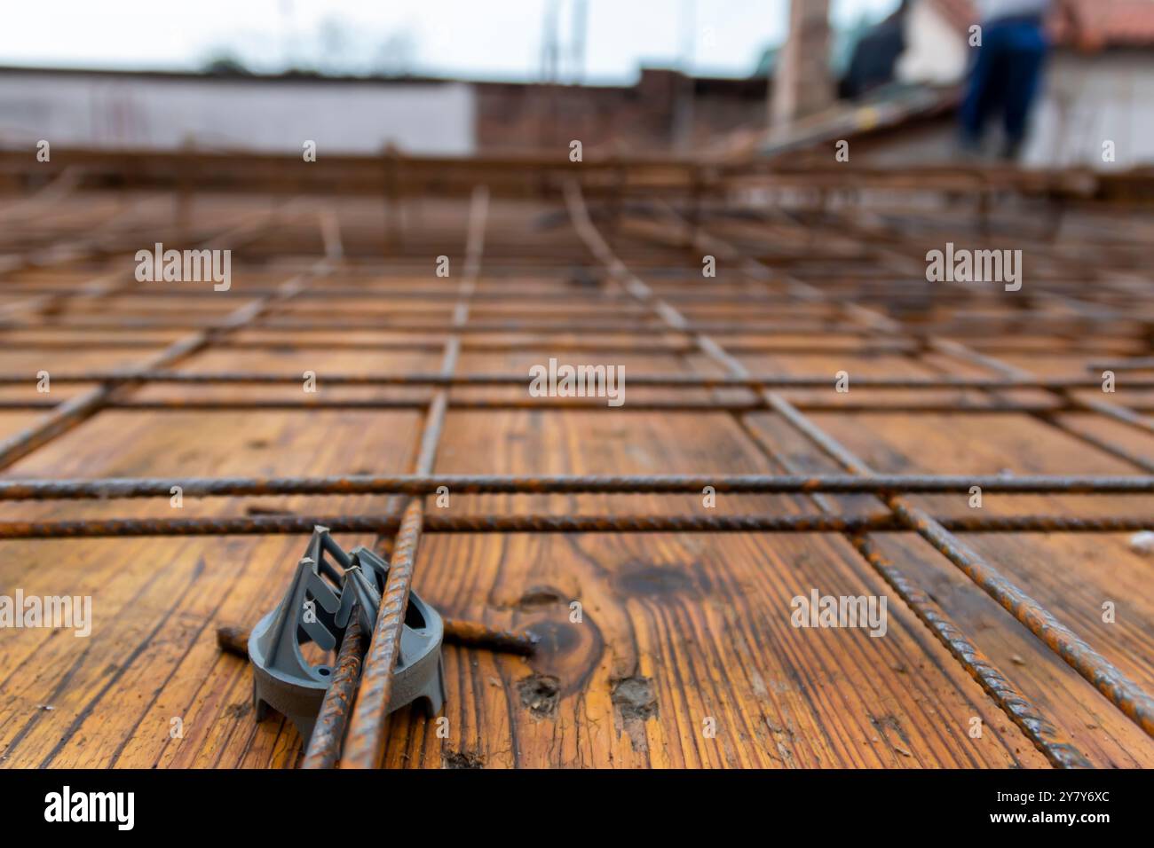 Web of metal rebar or armature steel on the construction site, concrete ...