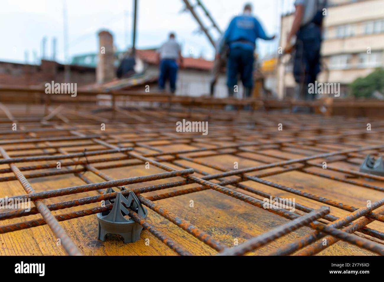 Web of metal rebar or armature steel on the construction site, concrete ...