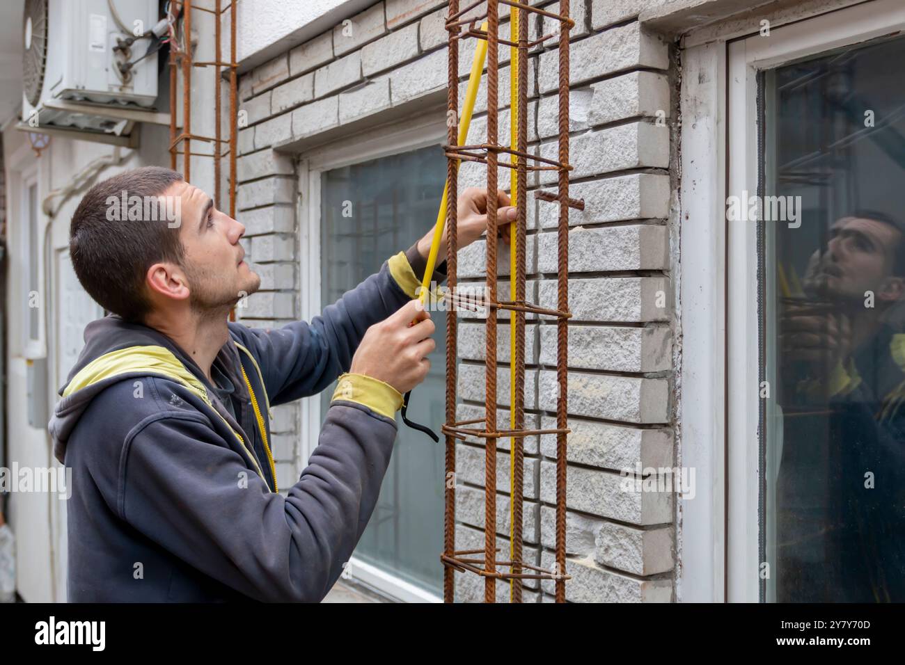 Construction worker. Worker in the construction site making ...