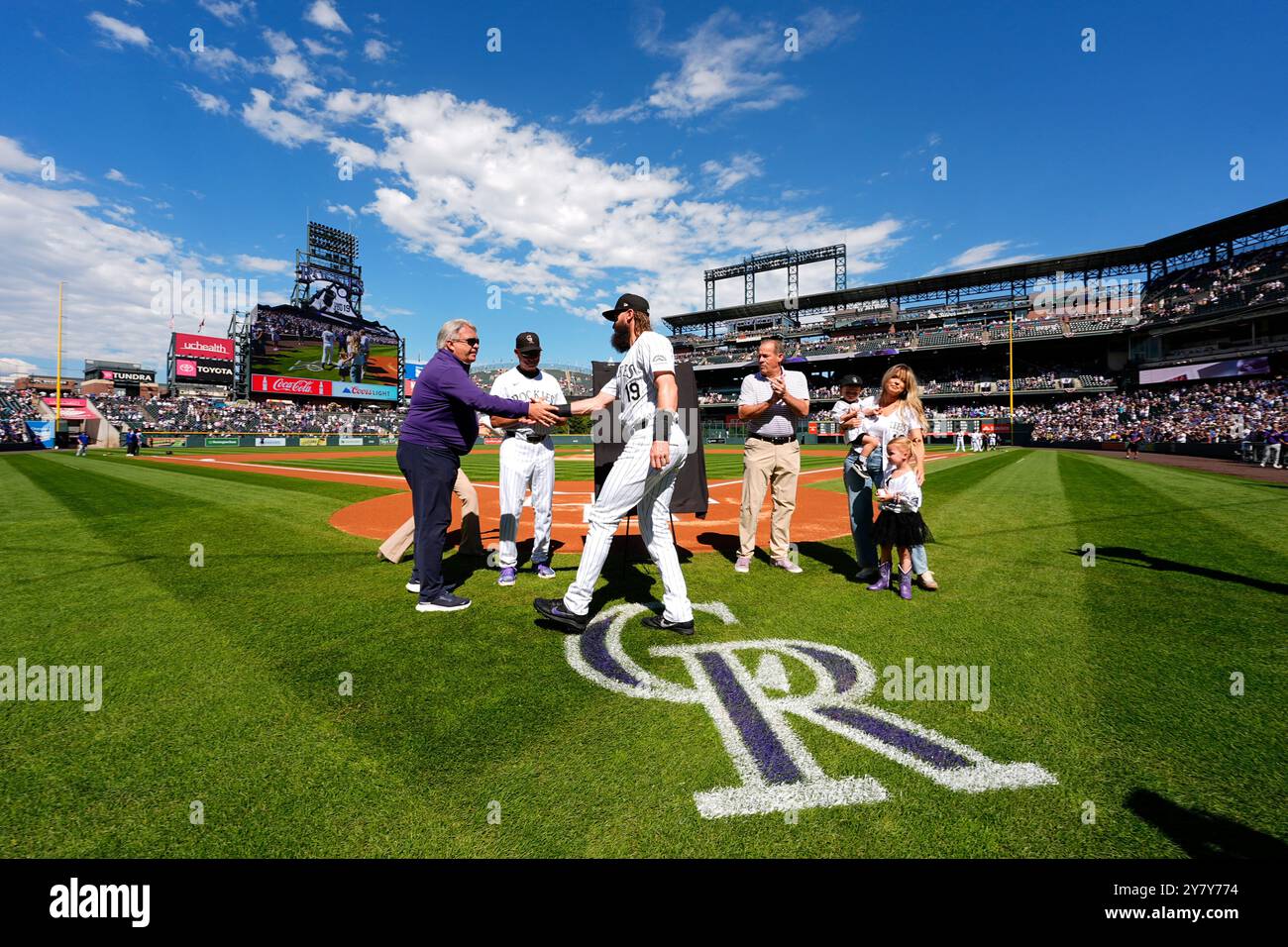 Colorado Rockies center fielder Charlie Blackmon (19) shakes hands with ...