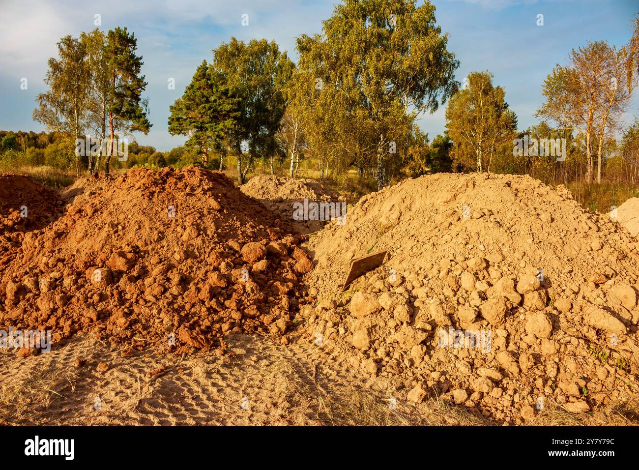Mounds of soil brought in to level the area Stock Photo - Alamy