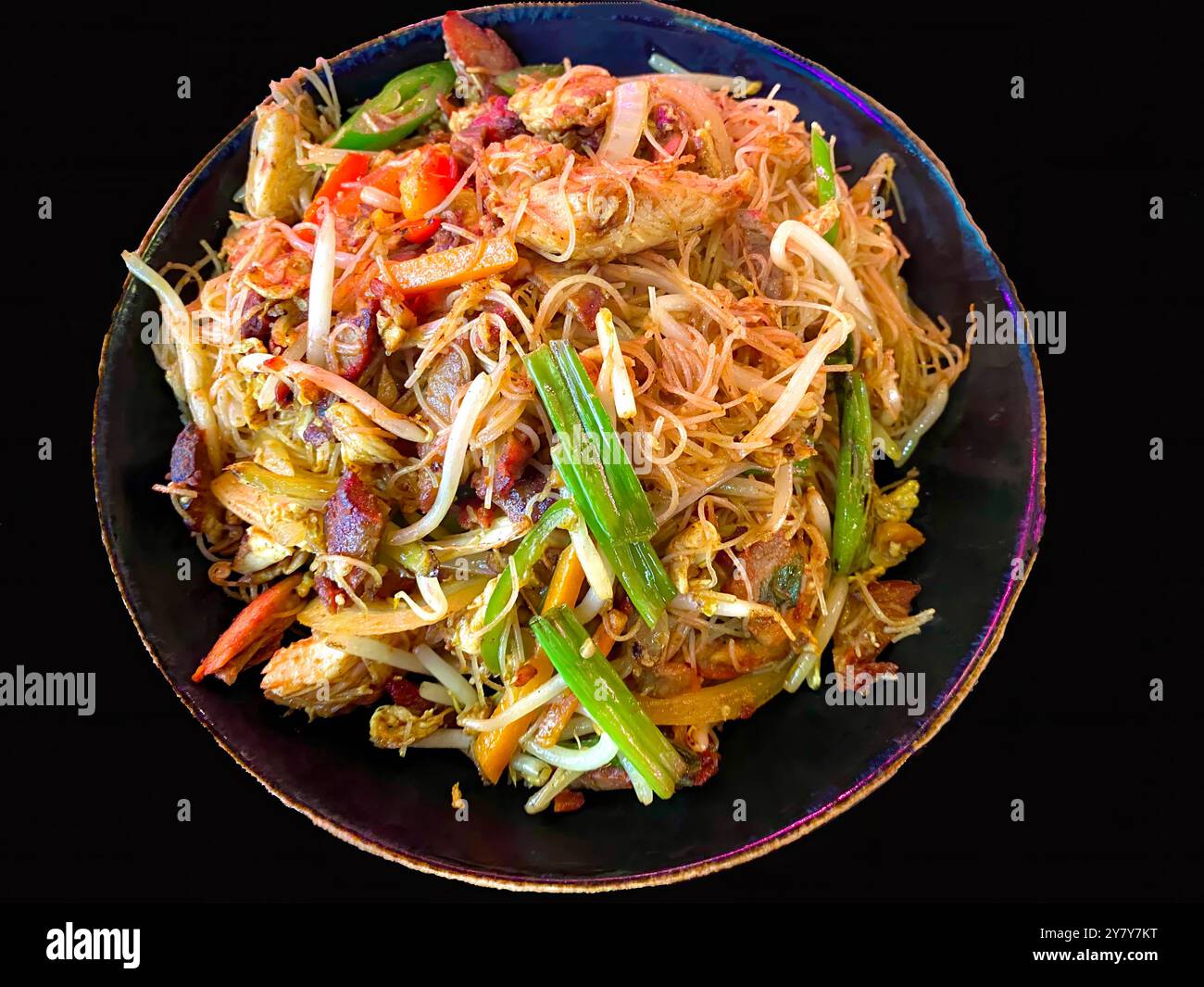 Delicious plate of spicy Asian Singapore rice noodles with meats ...