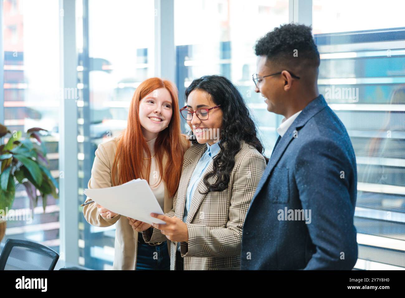 Collaborative project in bright co-working space led by young latin ...