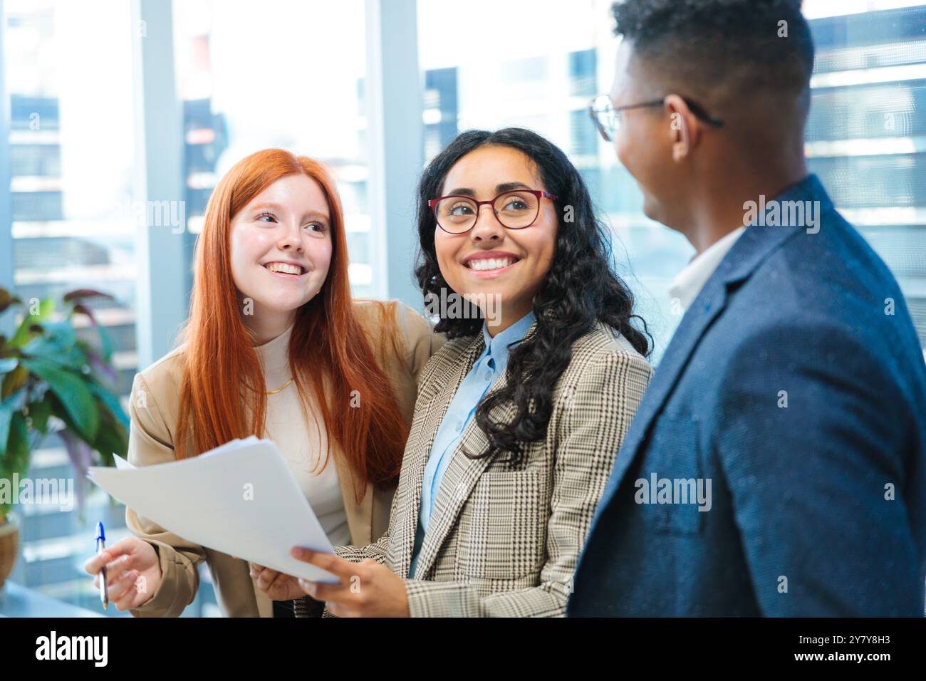 Latin businesspeople teamwork working in a collaborative project in ...