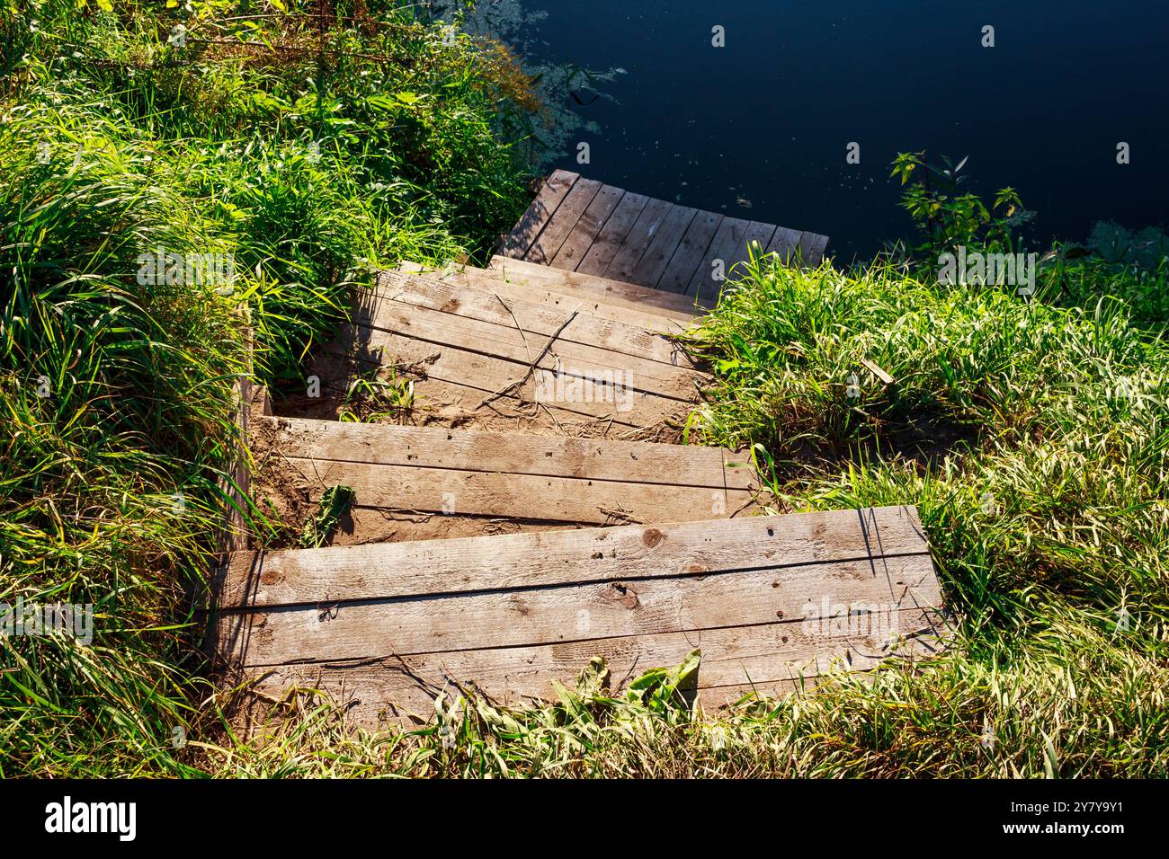 A step-by-step descent to the water on the reservoir equipped by ...