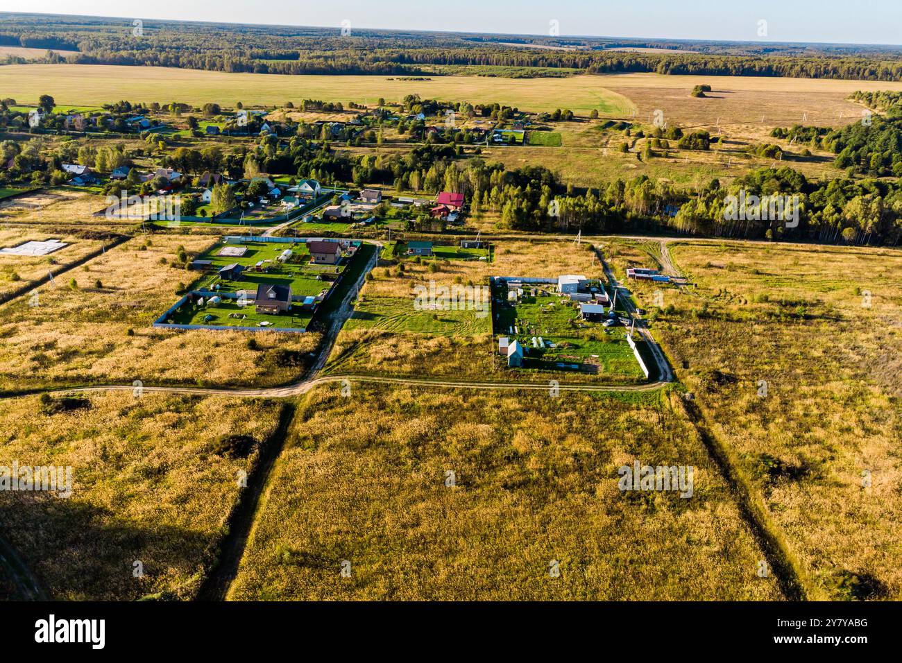 Aerial view of a flat area built up by country houses Stock Photo - Alamy