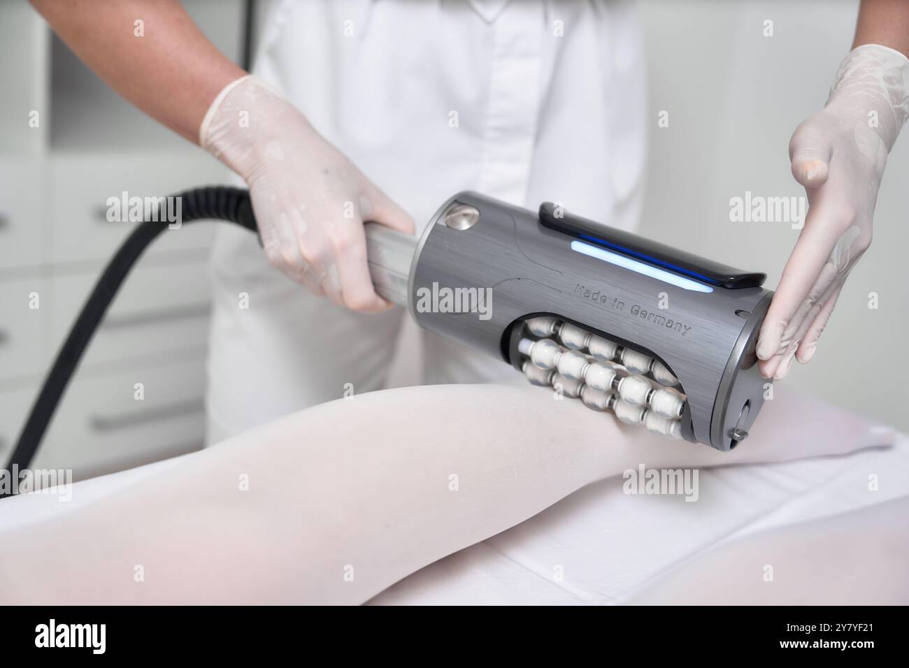 Aesthetic treatment session using advanced equipment at a clinic Stock ...