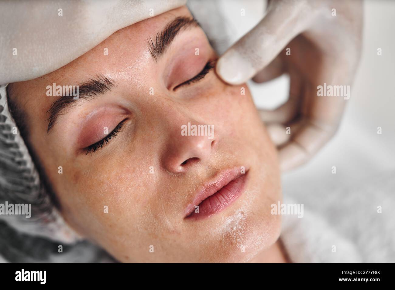Aesthetic treatment session for a woman at a beauty clinic during ...