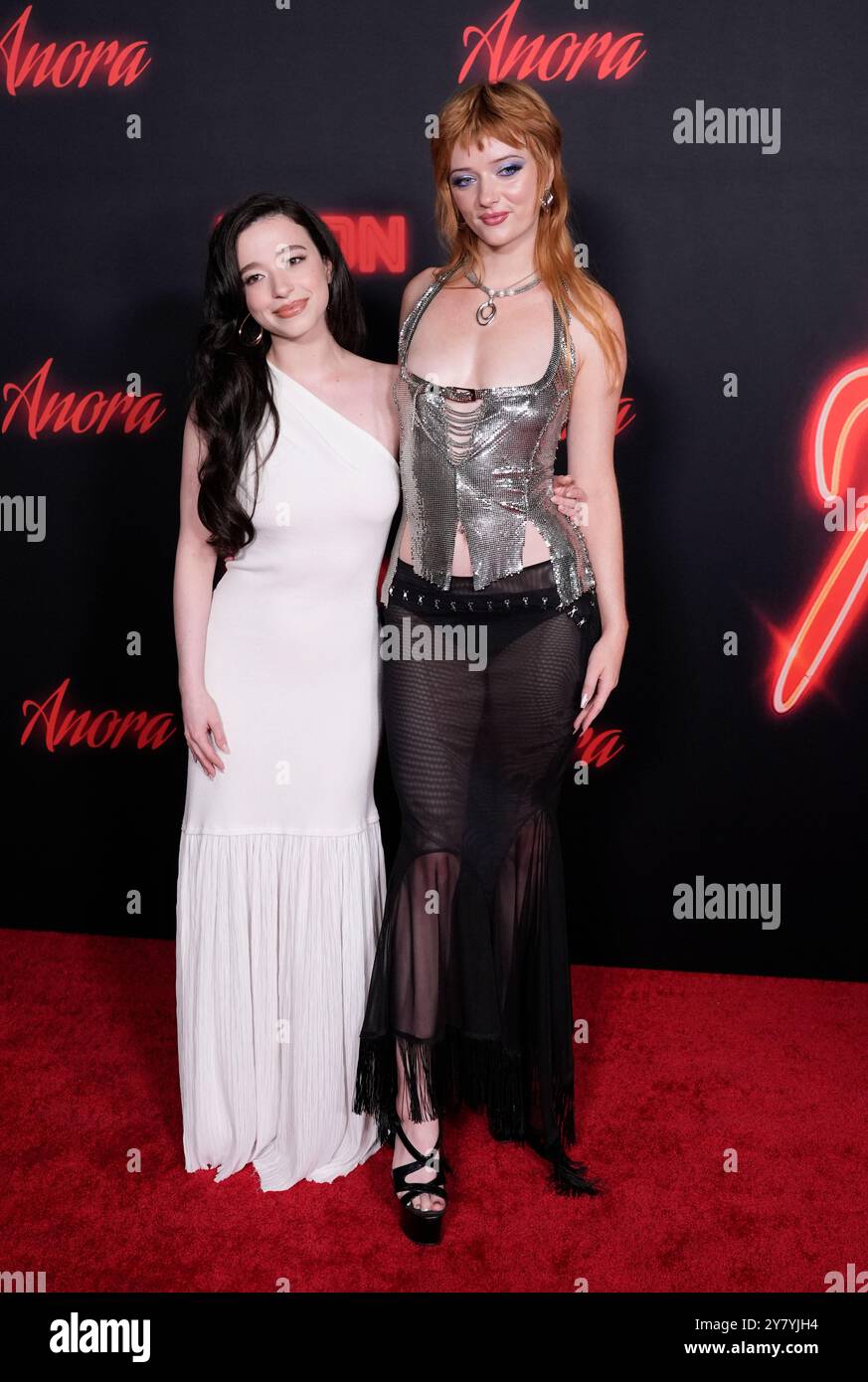 Mikey Madison, left, and Lindsey Normington, cast members in "Anora ...