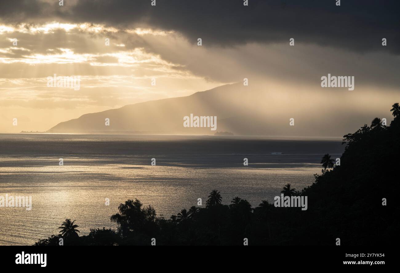 Sunset over the island. Teahupoo. French Polynesia Stock Photo - Alamy