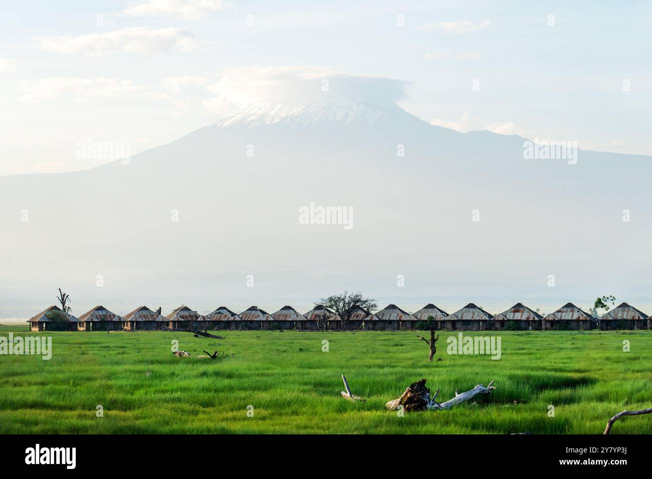 view of a tent camp on the background of Mount Kilimanjaro in the ...
