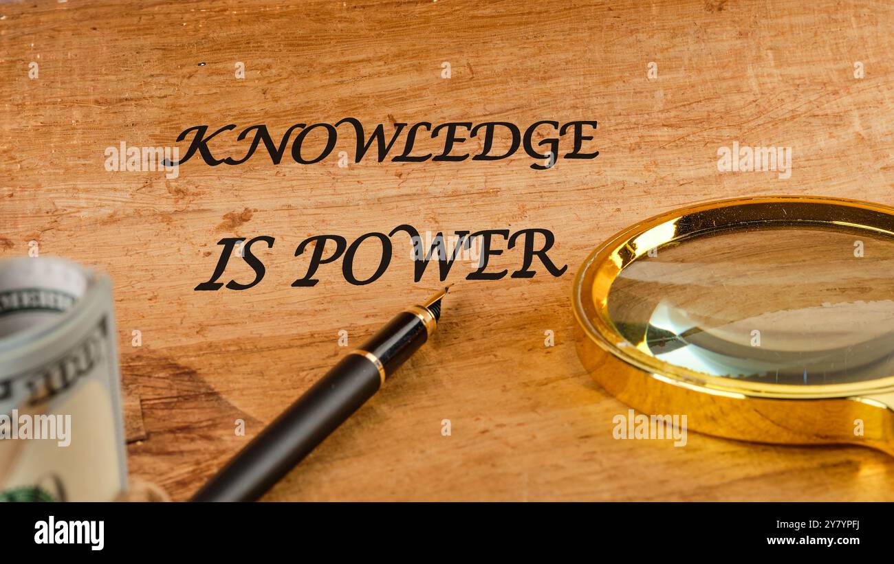 KNOWLEDGE IS POWER words on papyrus in a composition with a fountain ...