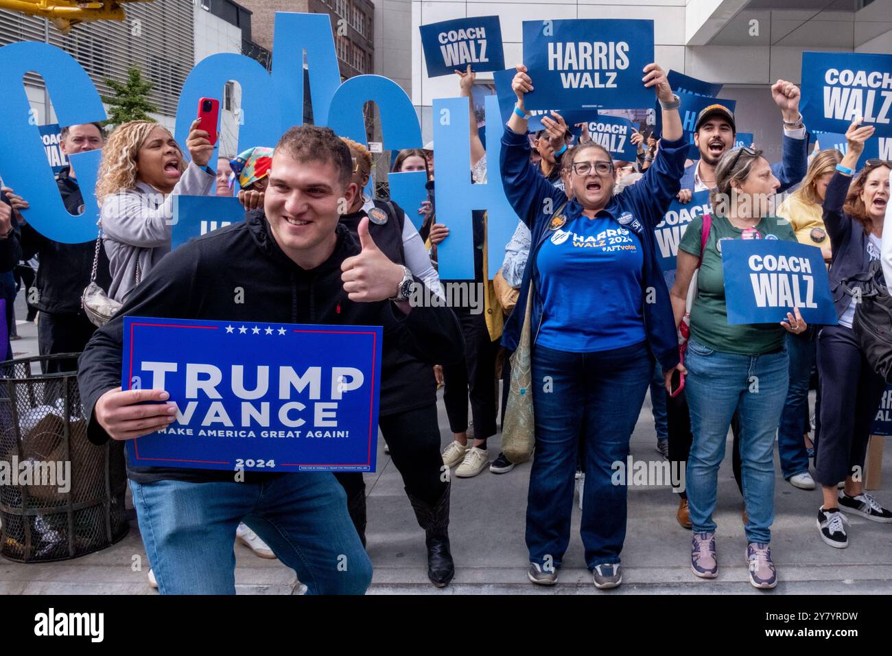 New York, United States. 01st Oct, 2024. A Trump supporter poses in ...