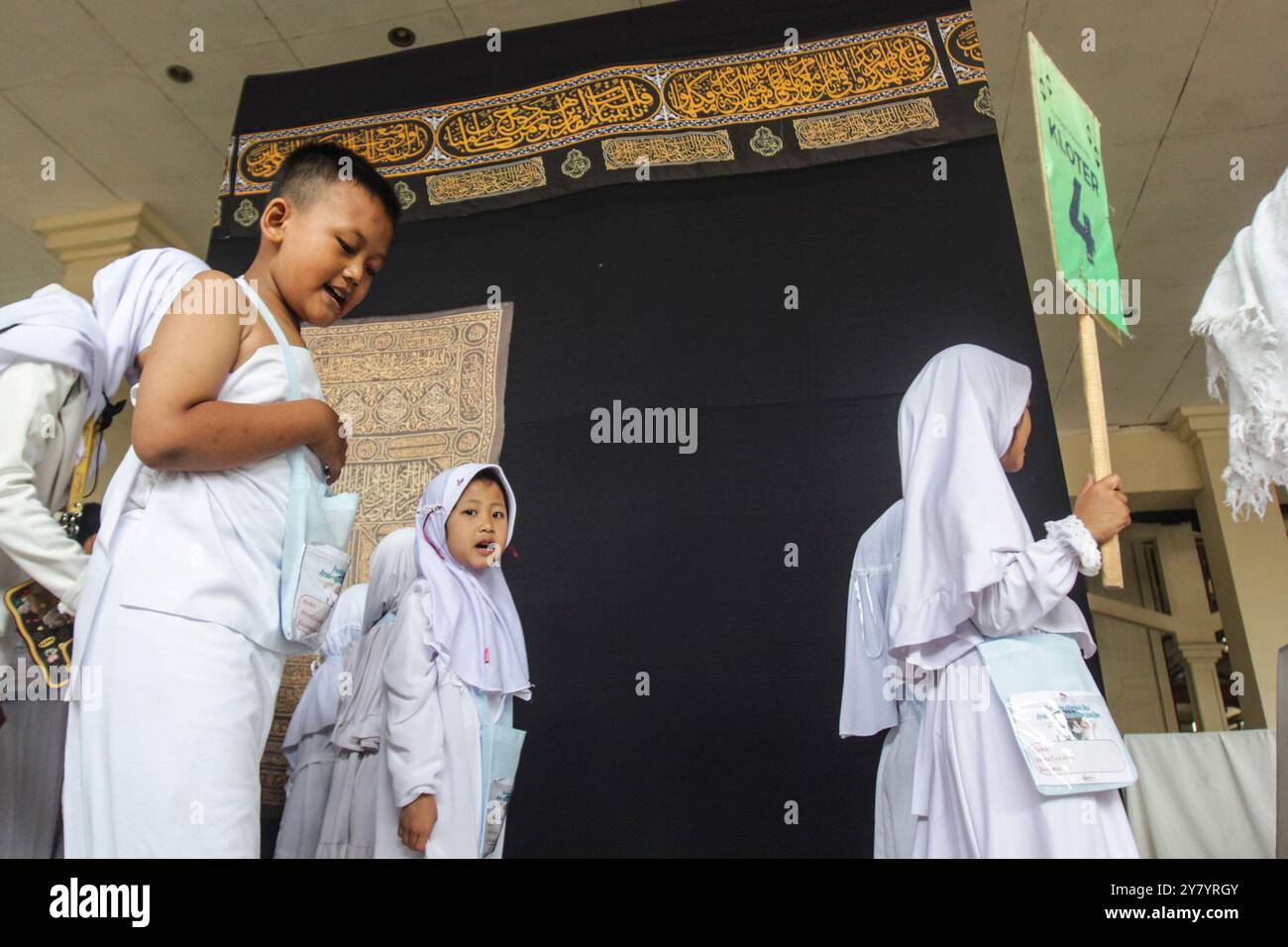 Bandung, West Java, Indonesia. 2nd Oct, 2024. Preschool students (PAUD) perform tawaf or walk ...