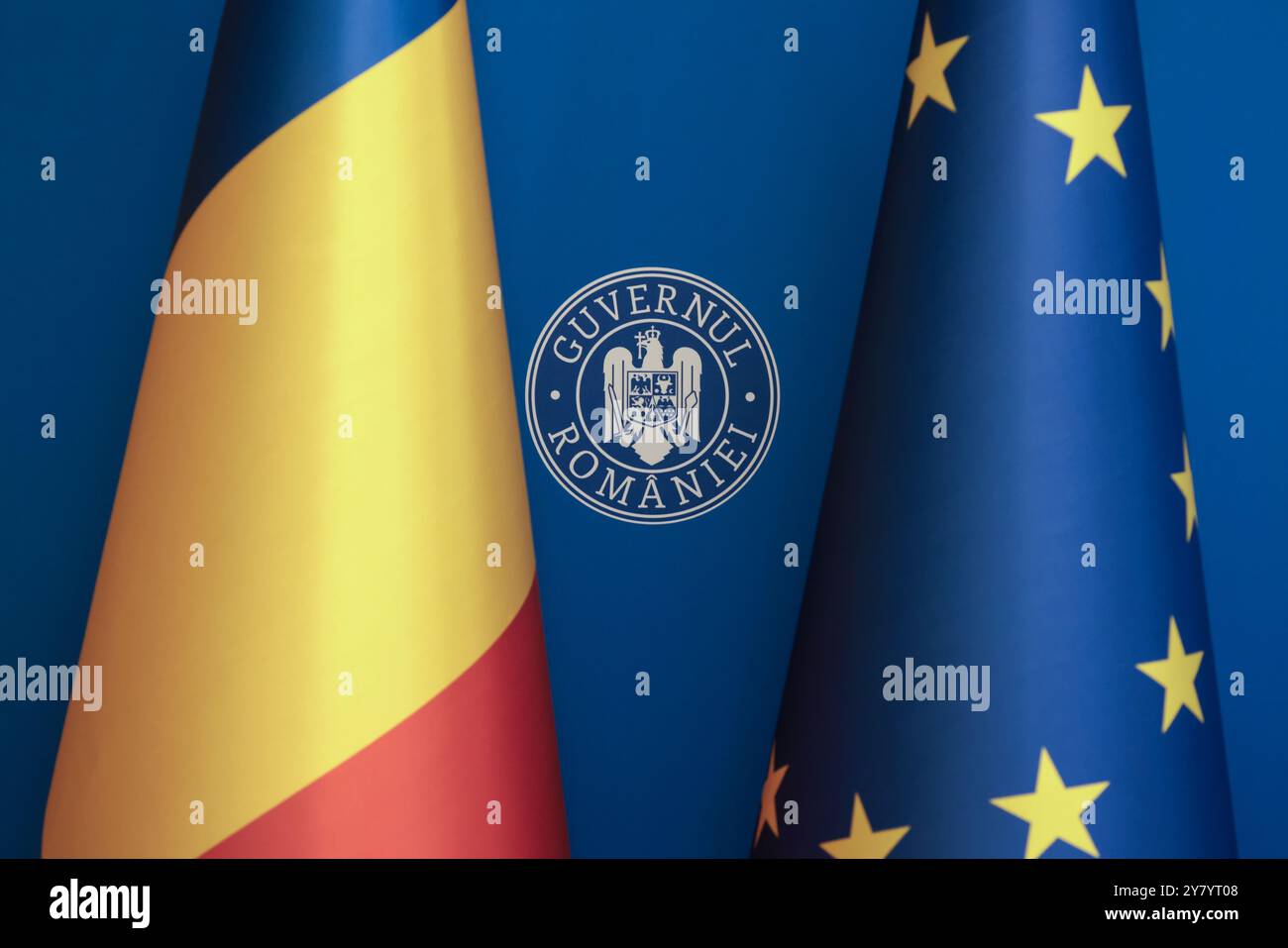 Romanian Government logo between the Romanian and European Union flags ...