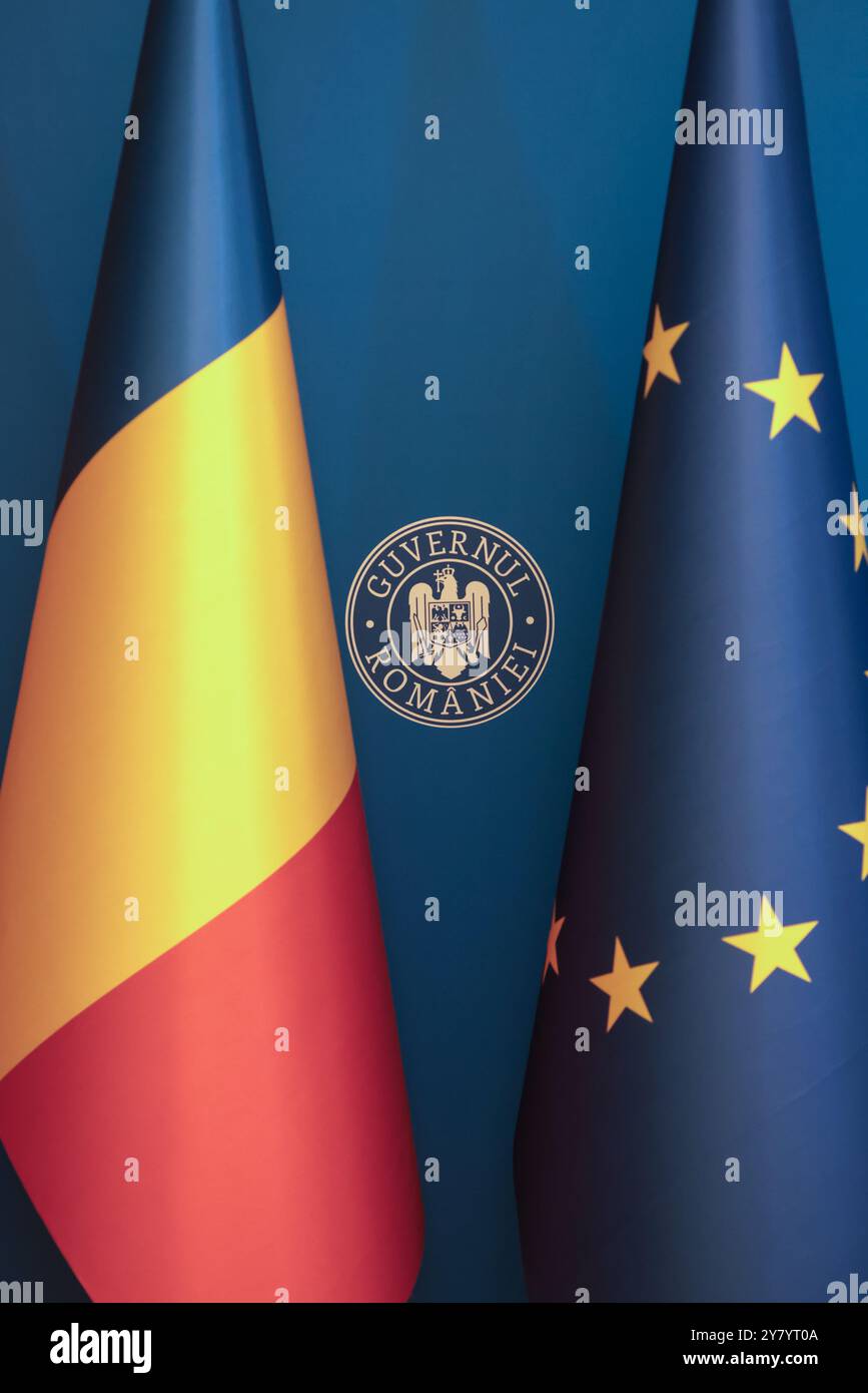 Romanian Government logo between the Romanian and European Union flags ...