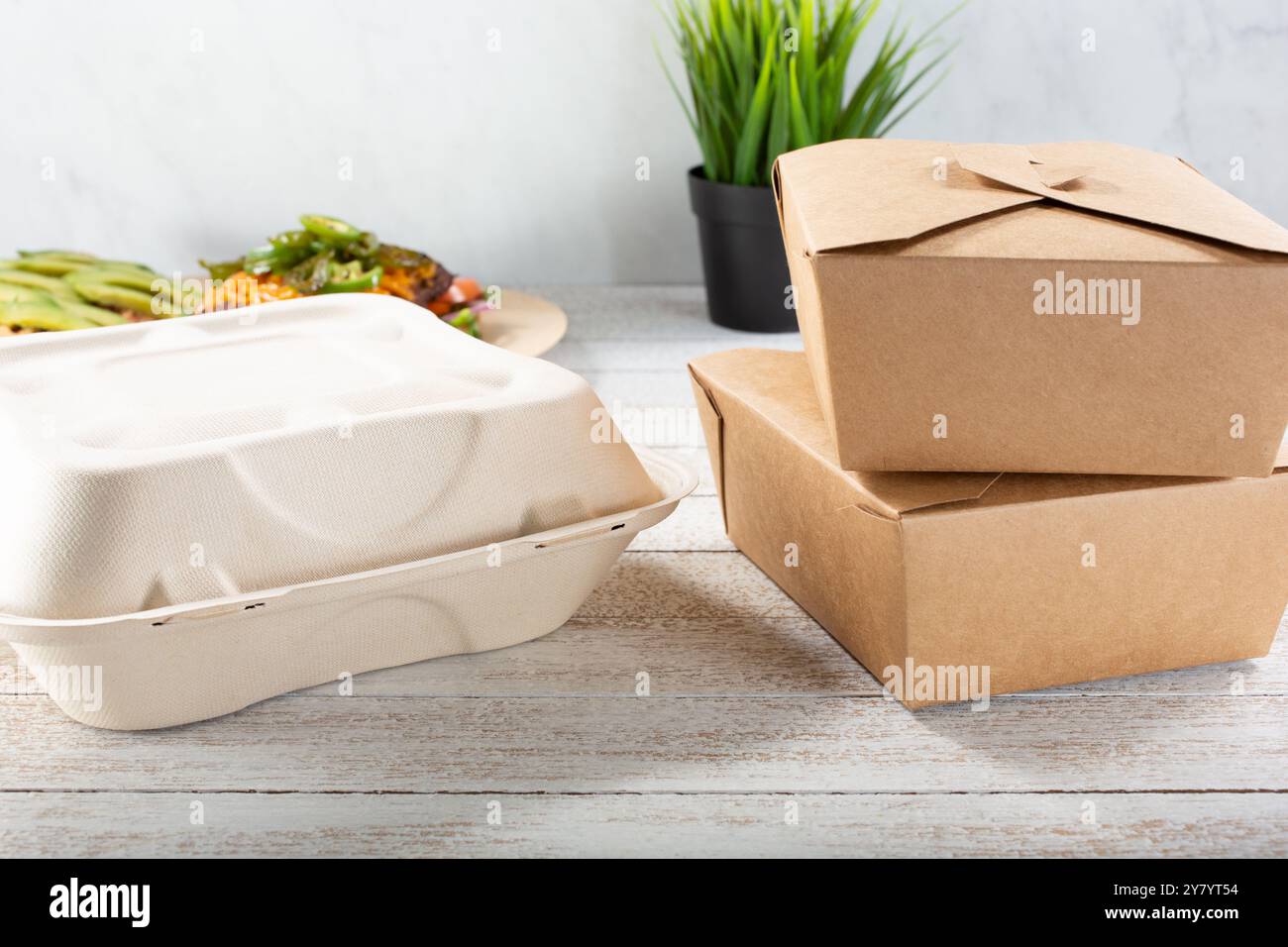 A view of a variety of to-go containers featuring clamshell and folding ...