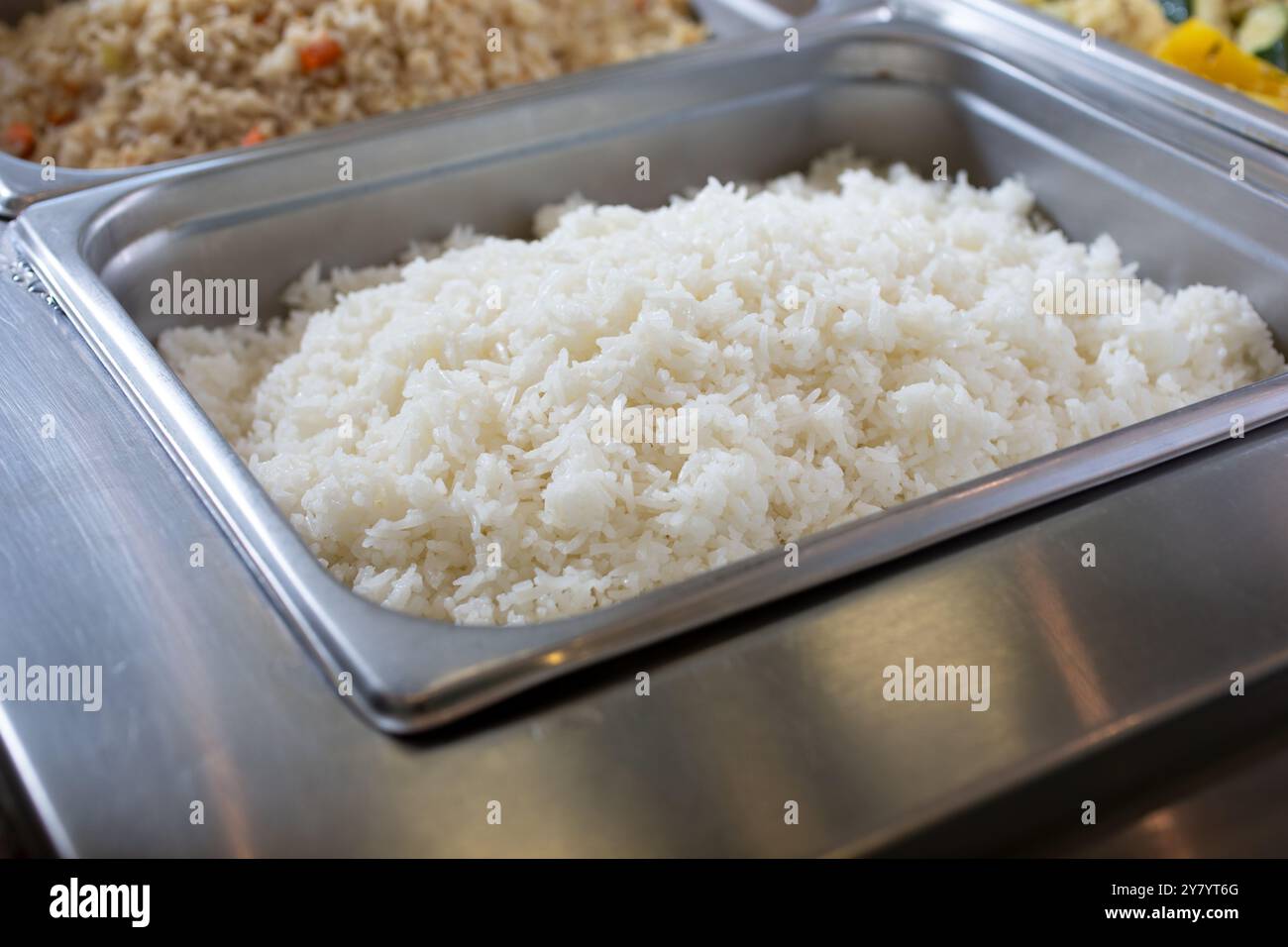A view of a steamer pan of steamed white rice Stock Photo - Alamy