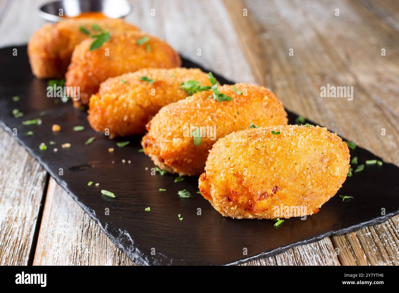 A view of an appetizer plate of croquettes Stock Photo - Alamy