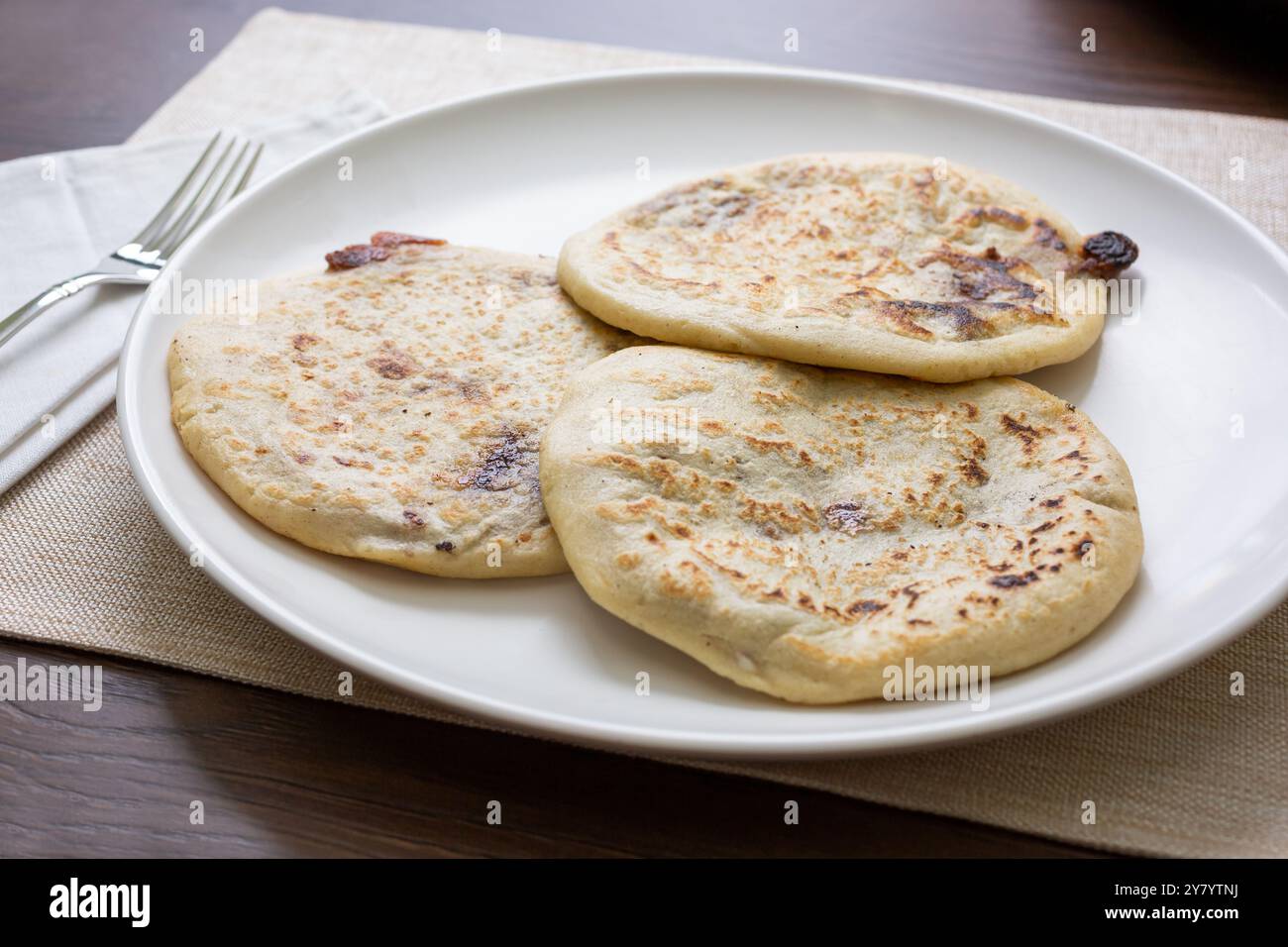 A view of a plate of pupusas Stock Photo - Alamy