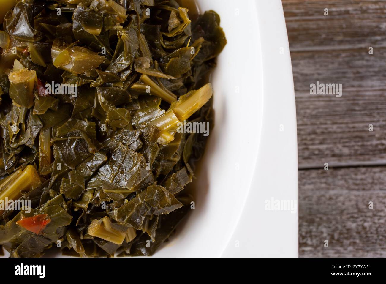A top down view of a bowl of collard greens Stock Photo - Alamy
