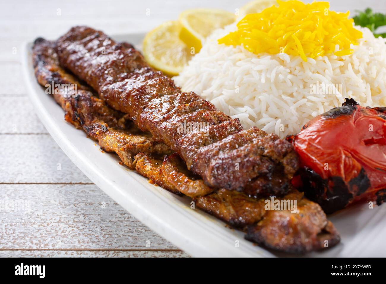 A view of combo filet mignon steak and beef soltani kabob, with saffron ...