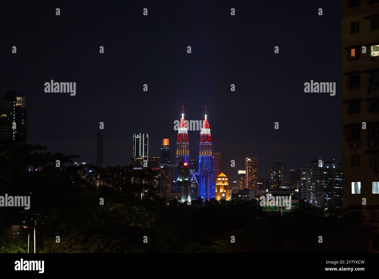 Close up night view of Petronas twin tower or KLCC with Malaysian light ...