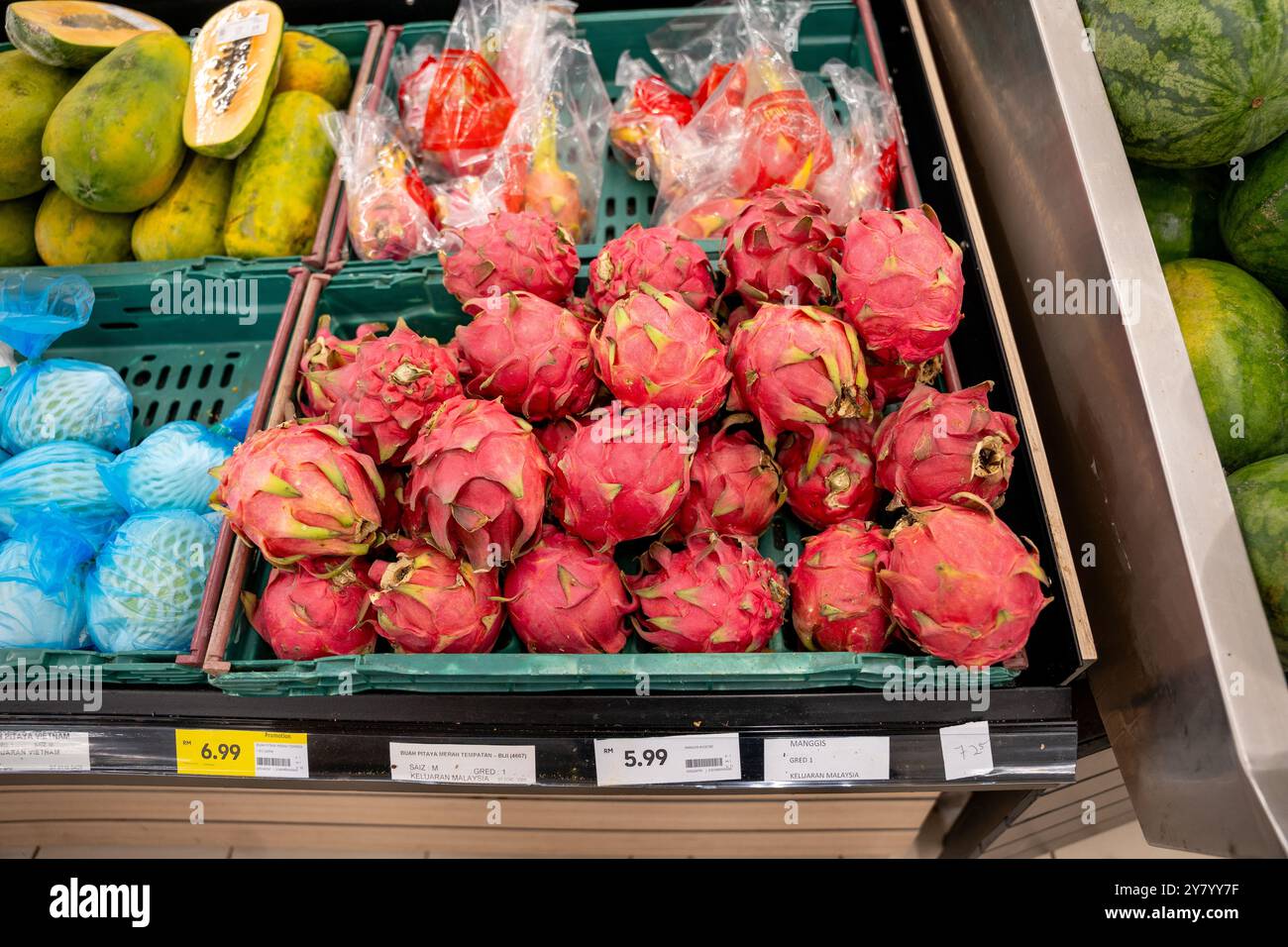 Various imported and local fruit on the local store, like red dragon ...