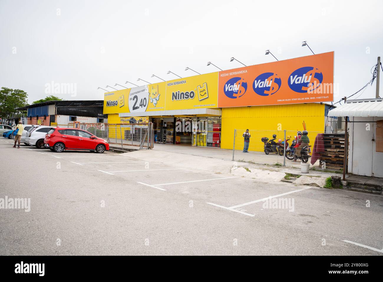 Bukit Beruntung, Selangor - Oct 19, 2024 : Bright yellow storefront of ...