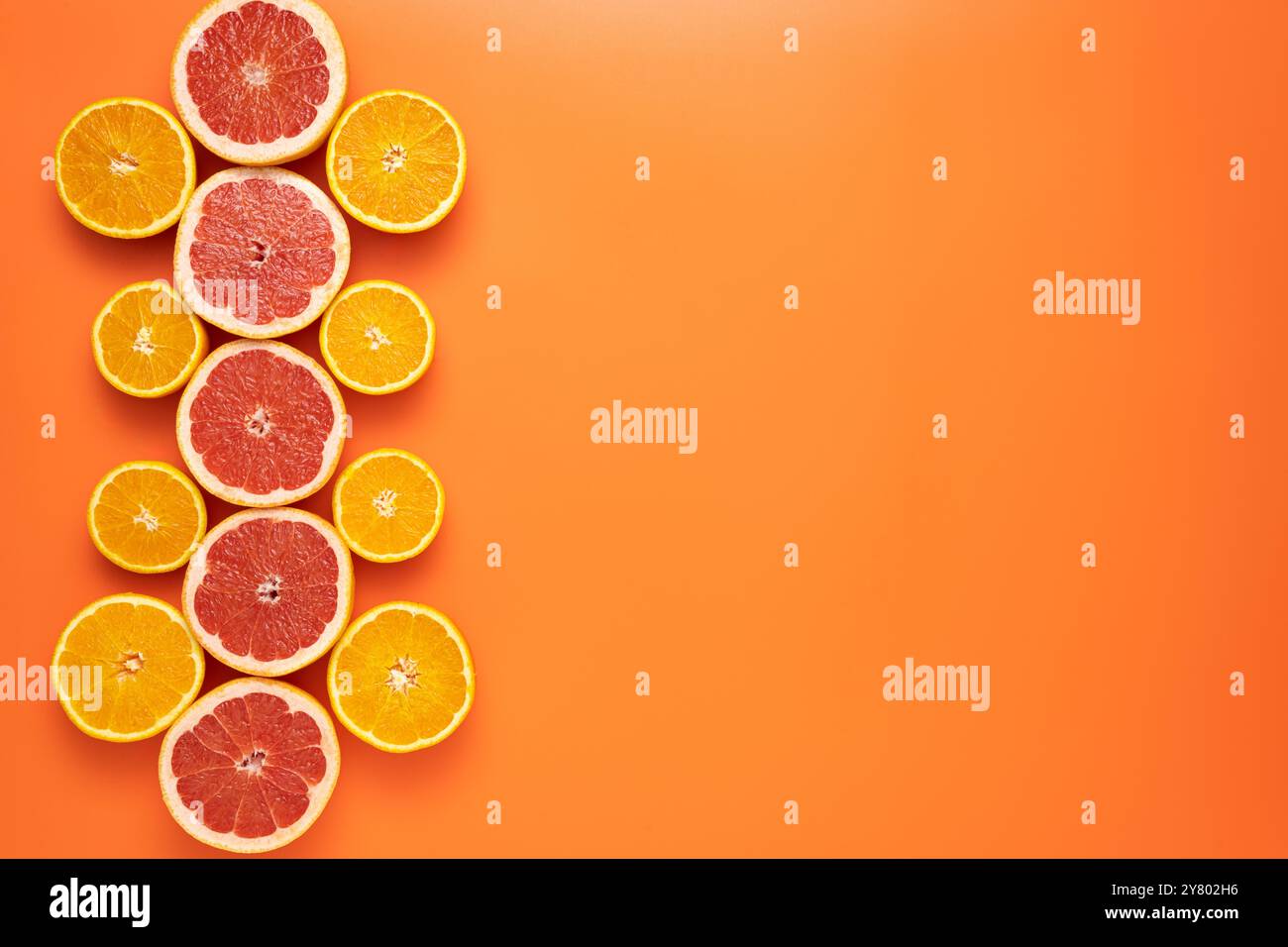 Concept for fresh, fruity and juicy fruit. Top view. Fresh sliced and ...