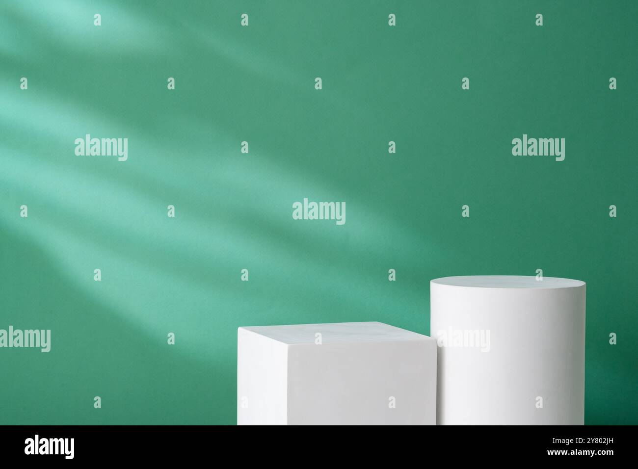 Simple geometric shapes on a green background with soft lighting Stock ...