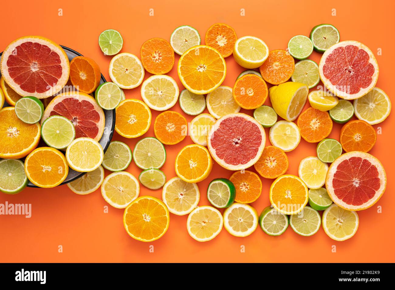 Concept for fresh, fruity and juicy fruit. Top view. Fresh sliced and ...