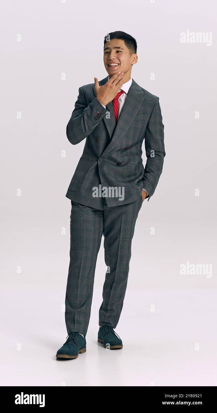 Full-length photo of young man dressed formal sui walking confidently ...